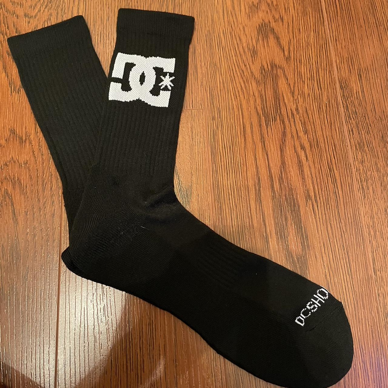 DC Shoes black and white crew socks Fits shoe size... - Depop