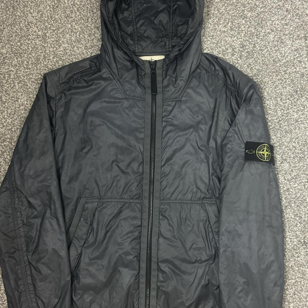 Stone Island Size XL holes are shown in the photo - Depop