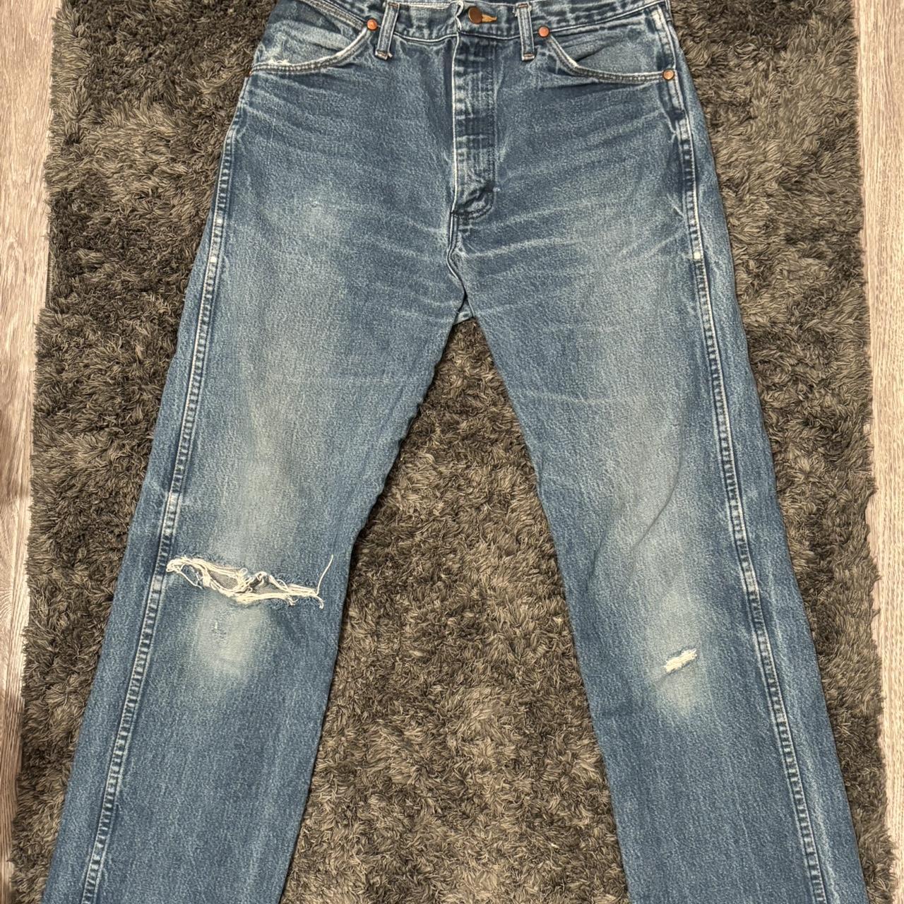 Wrangler blue jeans with ripped leg Size... | Depop