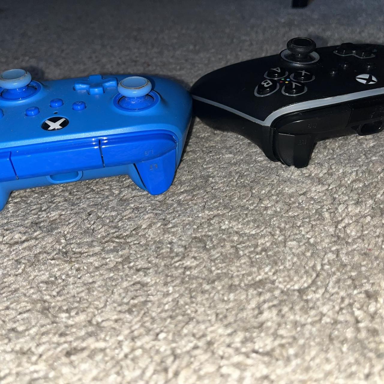 Blue and black Xbox controllers #depop... - Depop