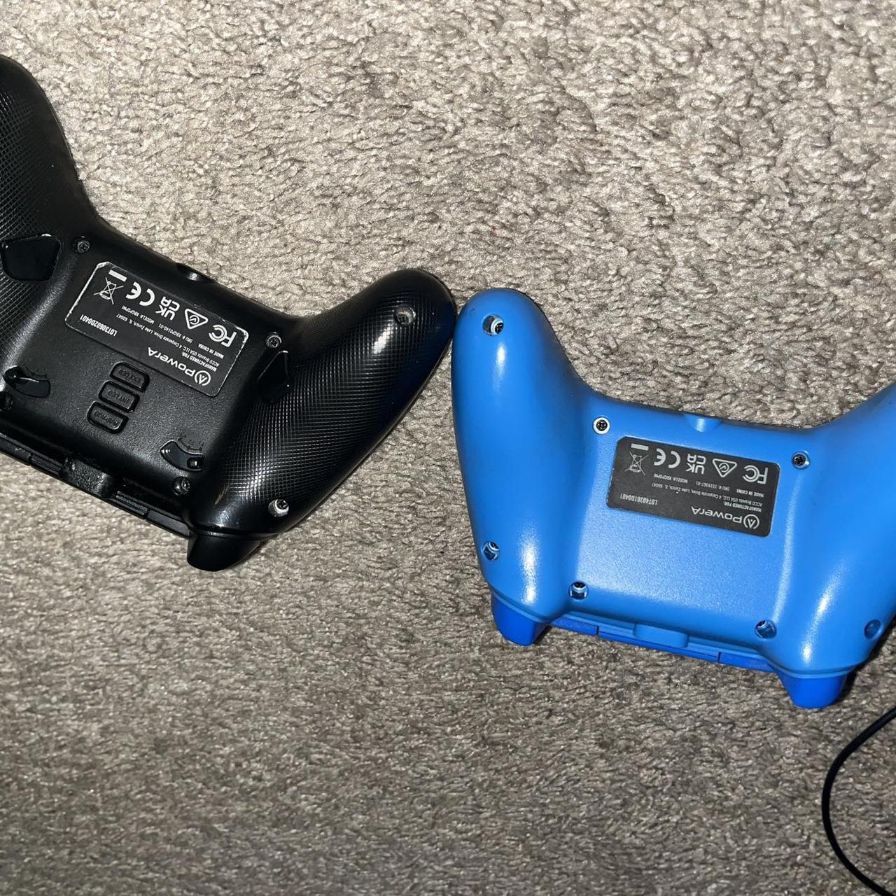 Blue and black Xbox controllers #depop... - Depop