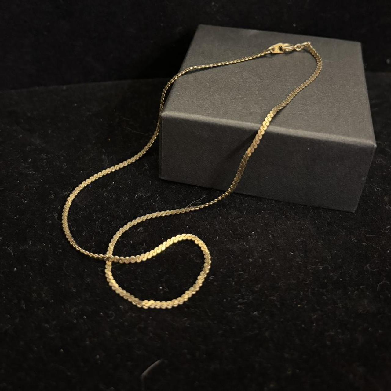 Vintage marked Napier gold toned chain. Does have... | Depop