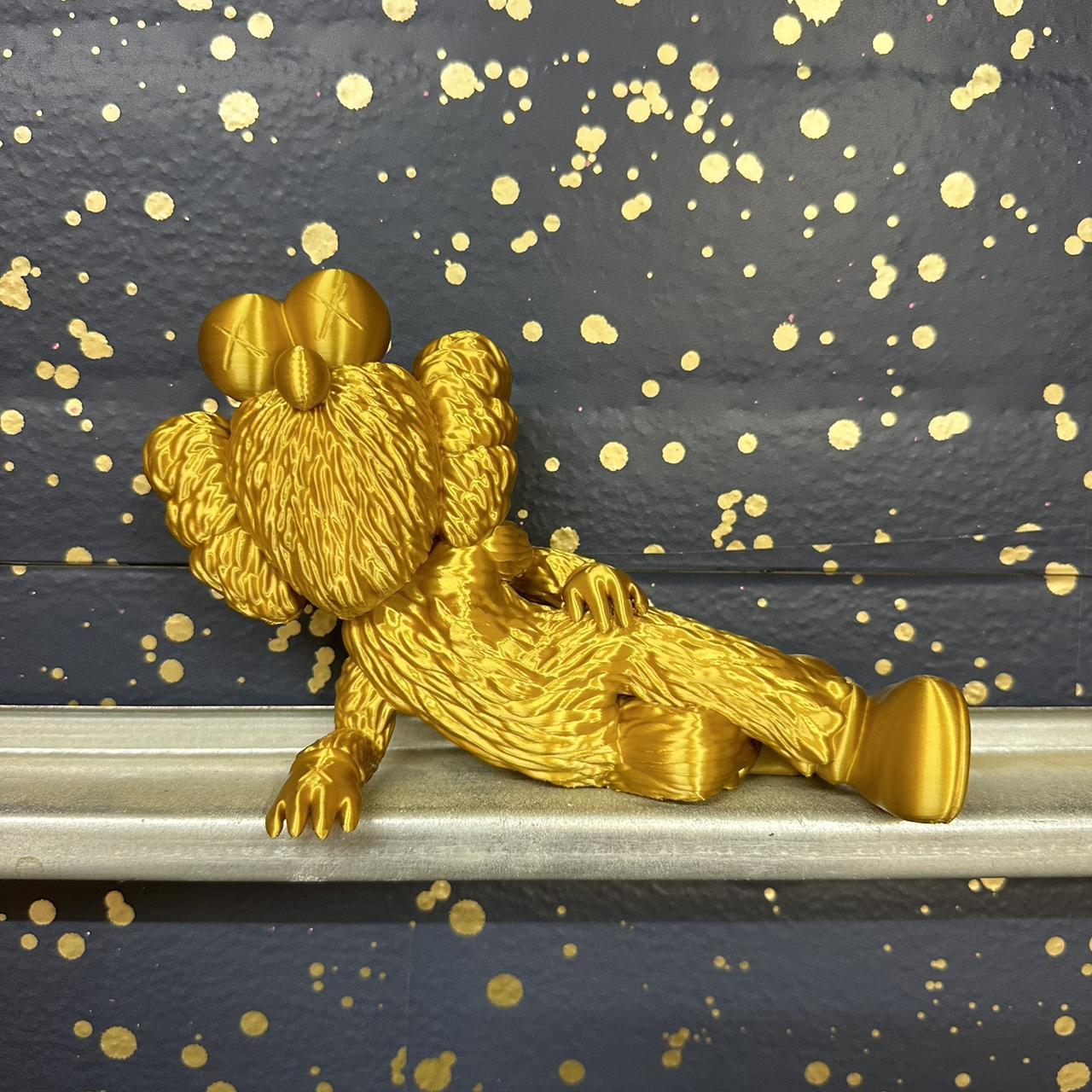 This Golden Kaws “Time Off” Figure measures 10”... - Depop