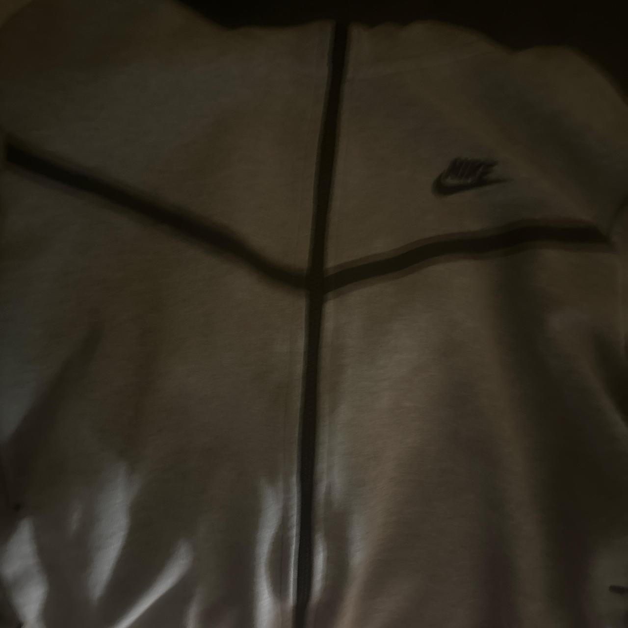 large grey nike tech - Depop