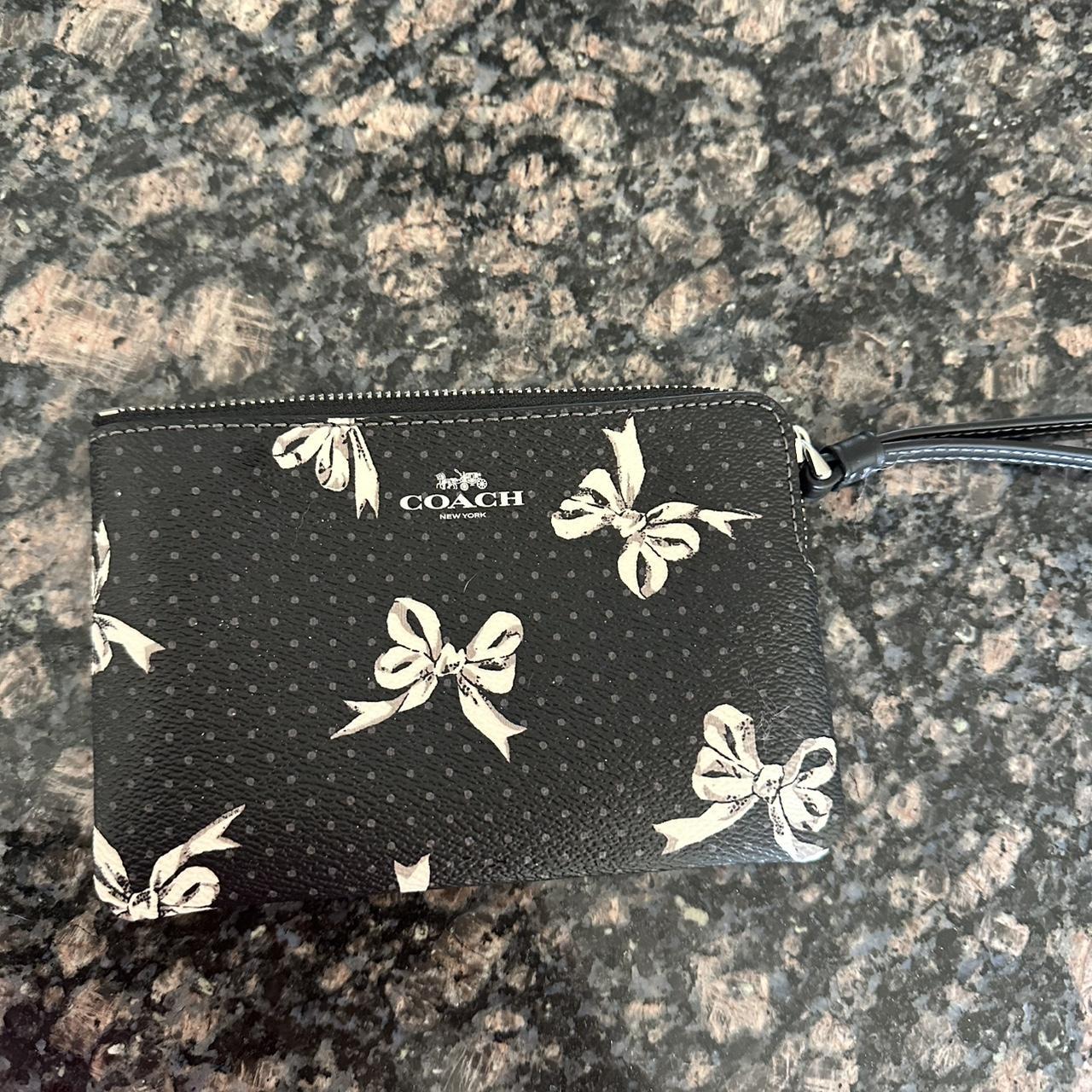 Coach black and white bow wristlet #CoachAccessories... | Depop