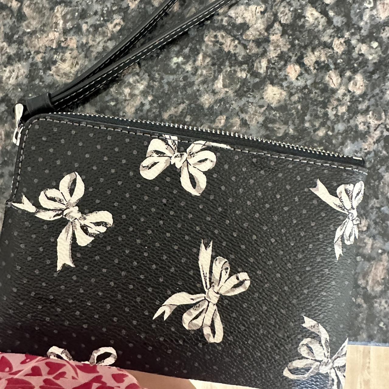 Coach black and white bow wristlet #CoachAccessories... | Depop