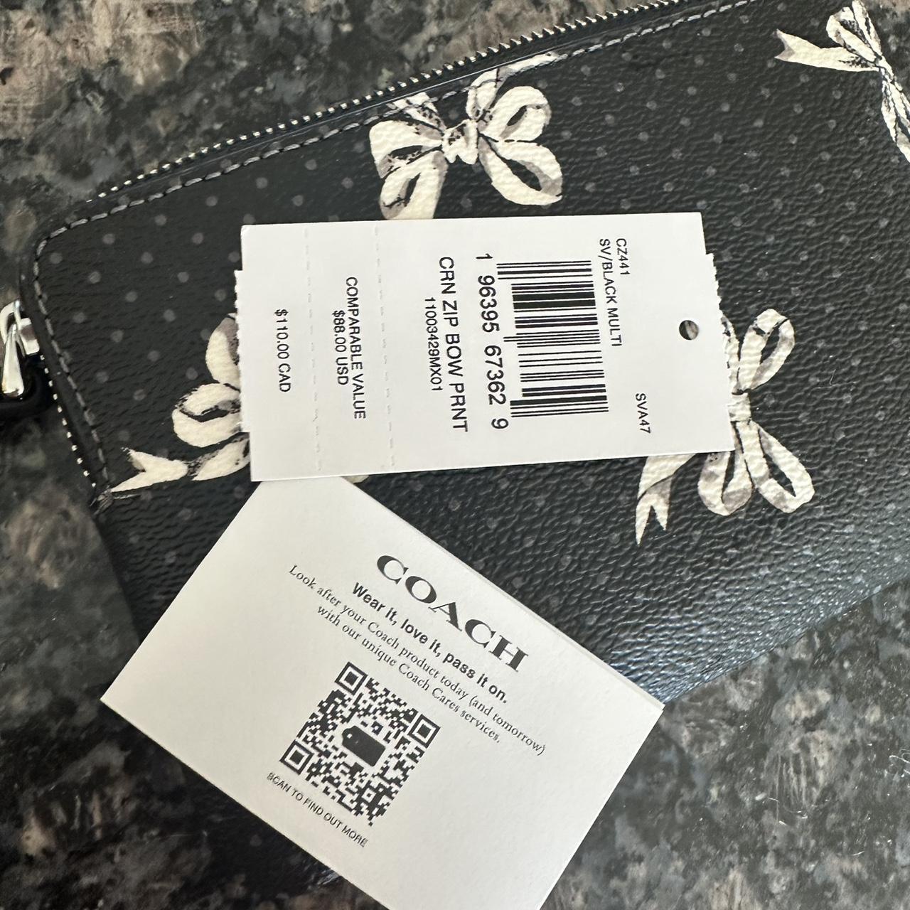Coach black and white bow wristlet #CoachAccessories... | Depop