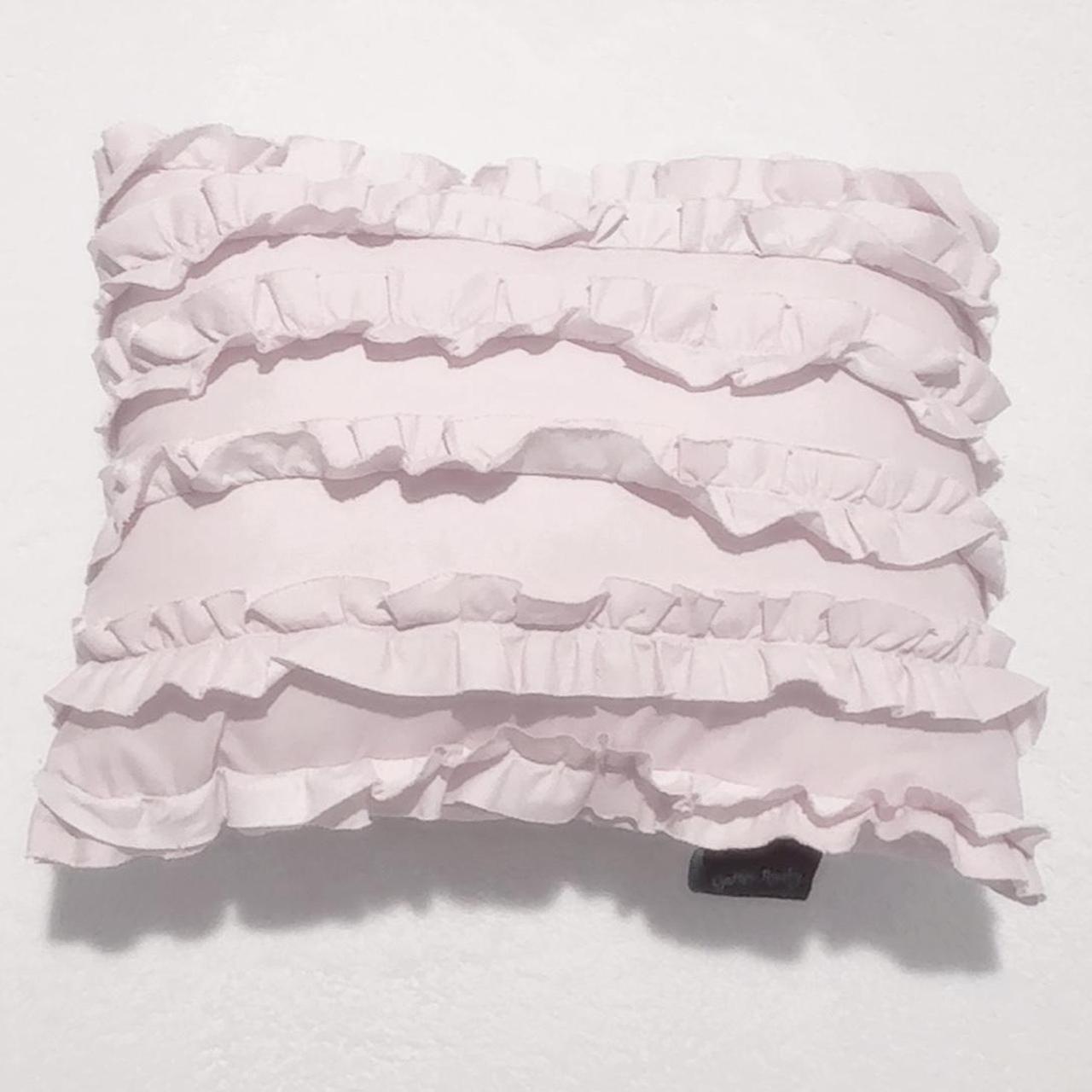 Pink ruffle pillow a fluffy, soft feel %100... | Depop