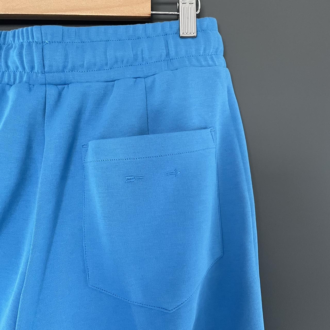 Aqua blue The Uoside flare sweatpants. Drawstring... - Depop