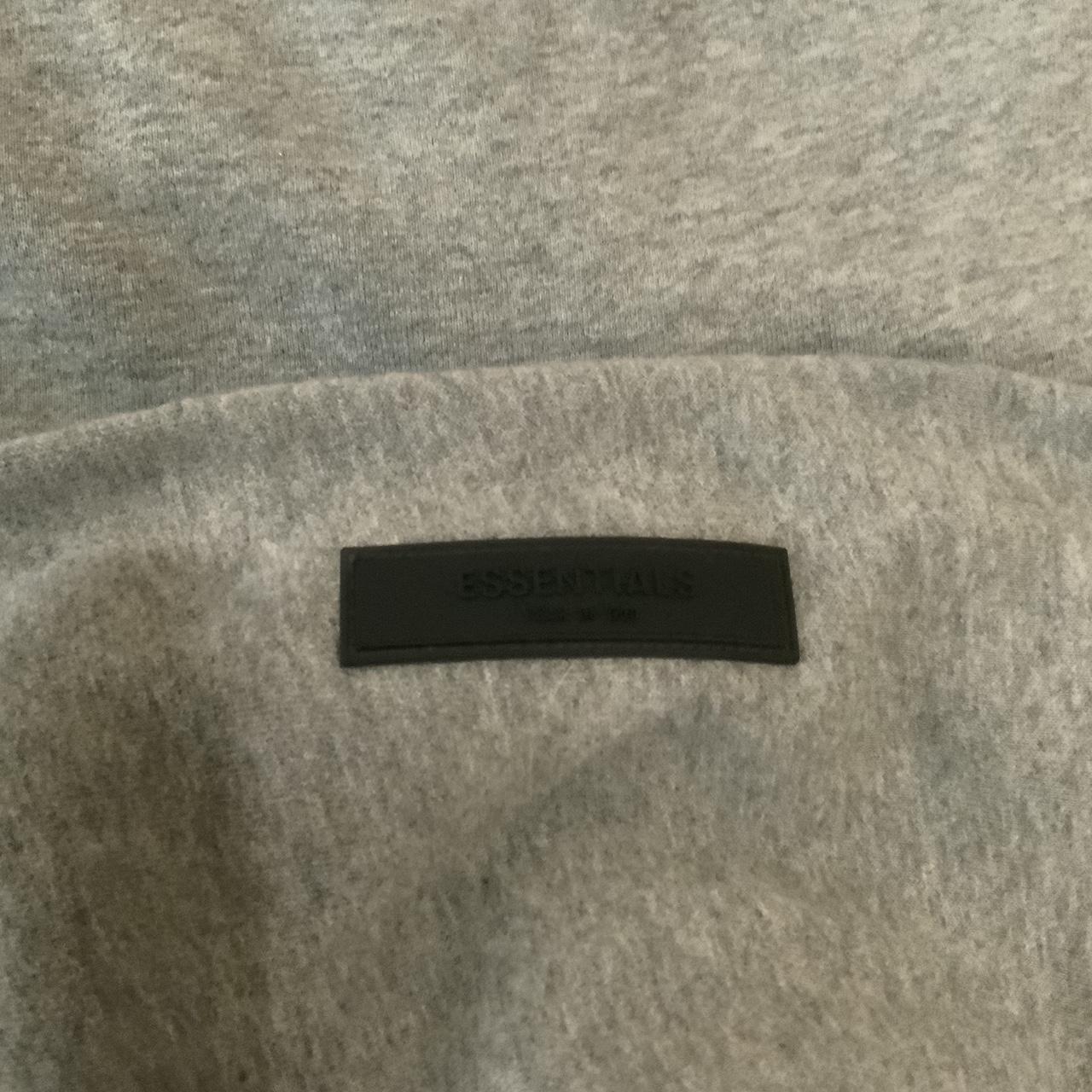 Essentials dark oatmeal ,medium - Depop