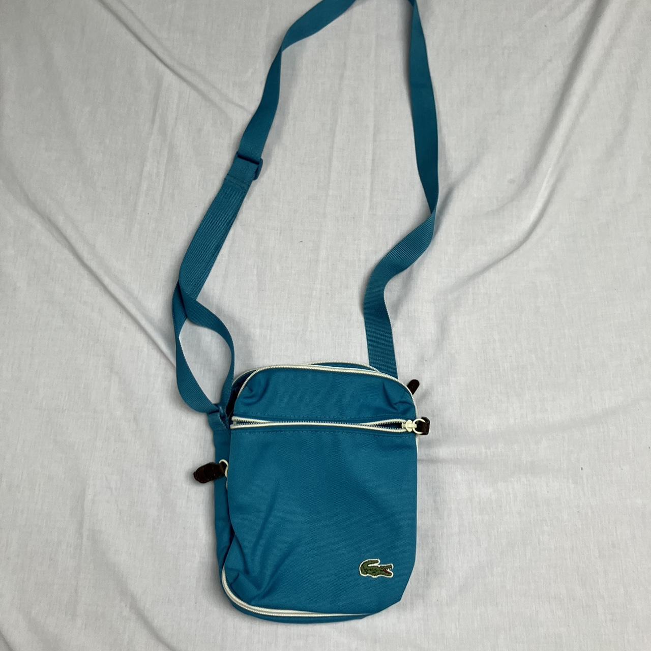 vintage light blue/teal lacoste side back great for... - Depop