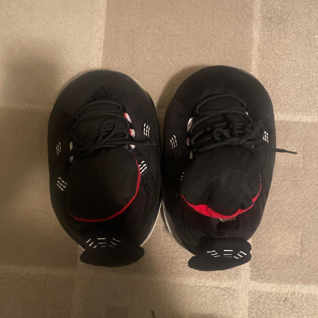 jordan four fluffy slippers - Depop