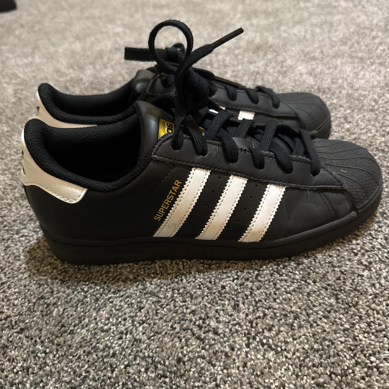 Black and white Adidas Superstar trainers Size: 6Y... - Depop
