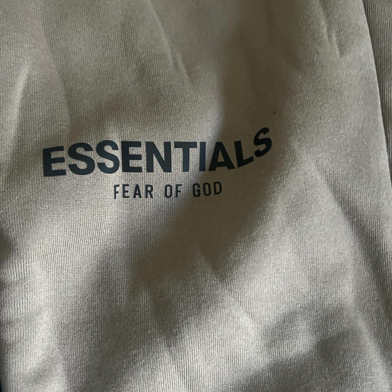 dark cream colored essentials sweatpants size medium... - Depop