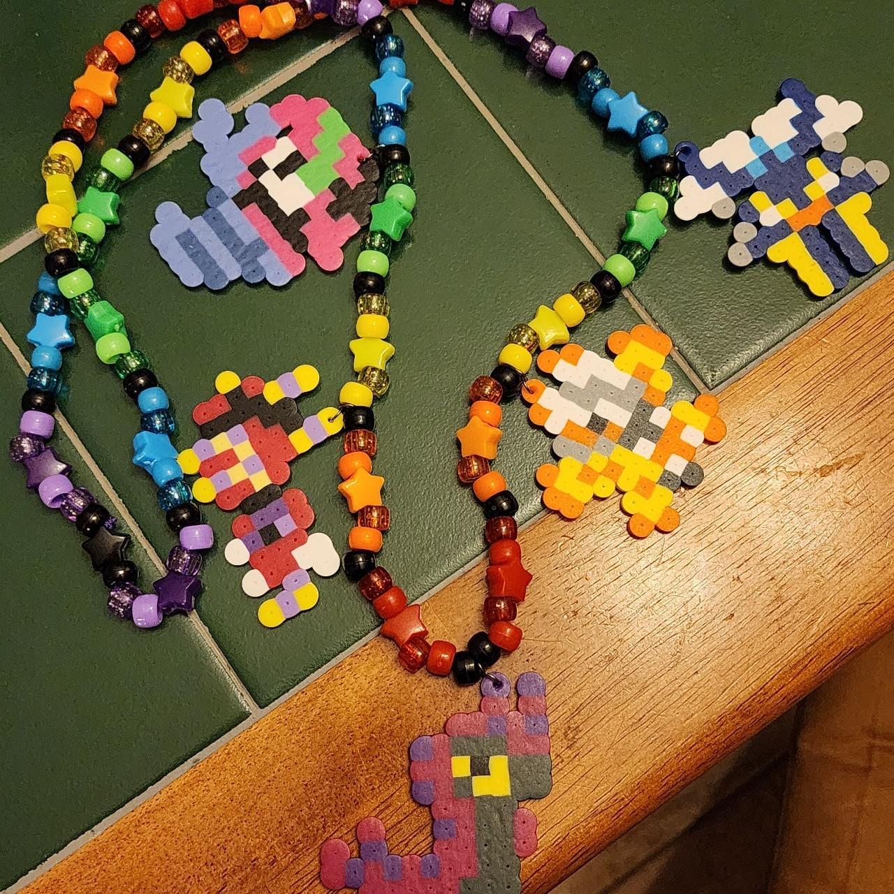 This handmade kandi necklace is based on bug types... - Depop