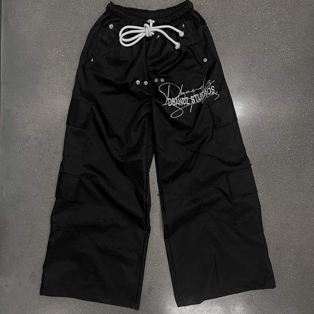 OVERSIZED FIT ELONGATED ROPES WIDEBODY 2 GUN... | Depop