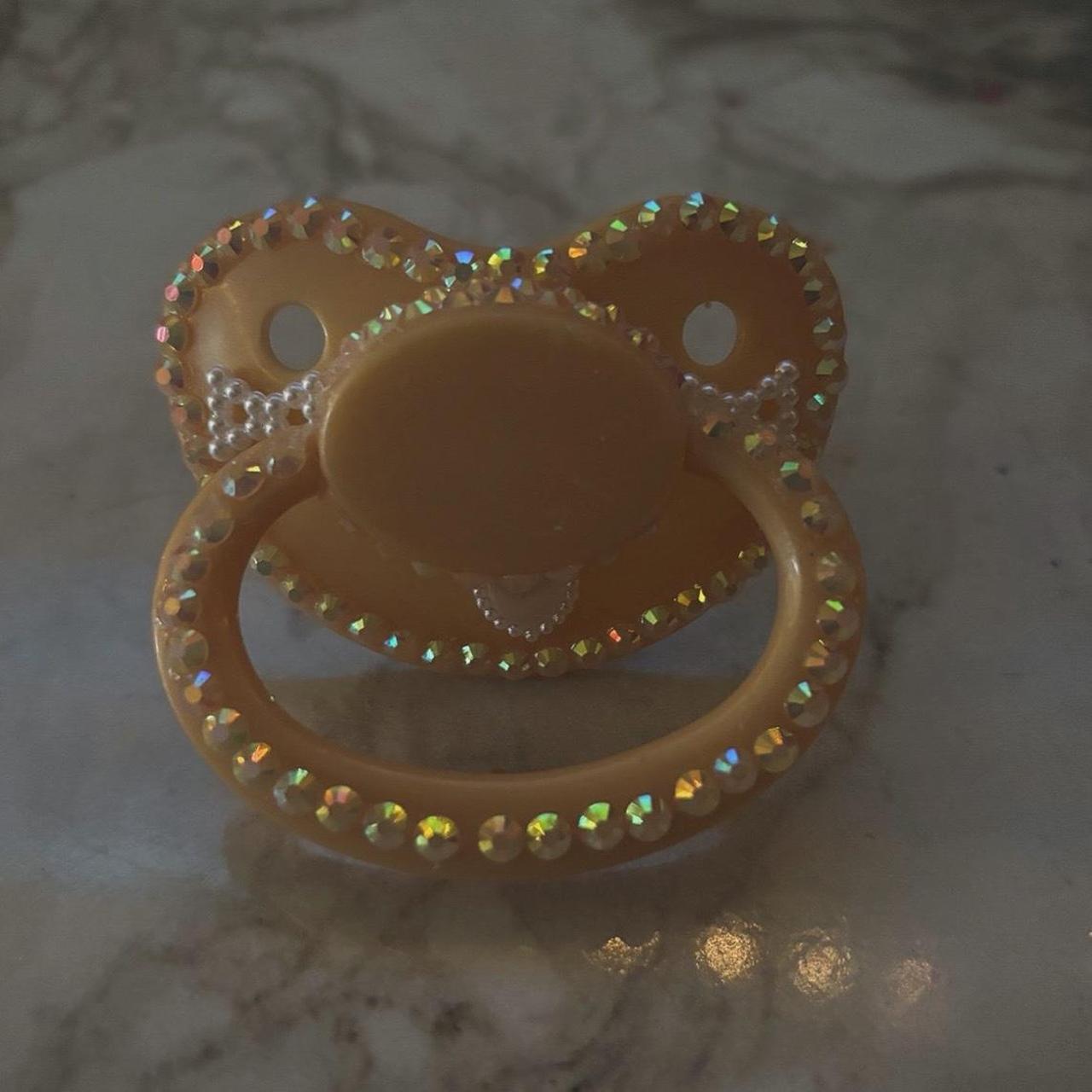 Tan and cream rhinestone pacifier with a bow... - Depop