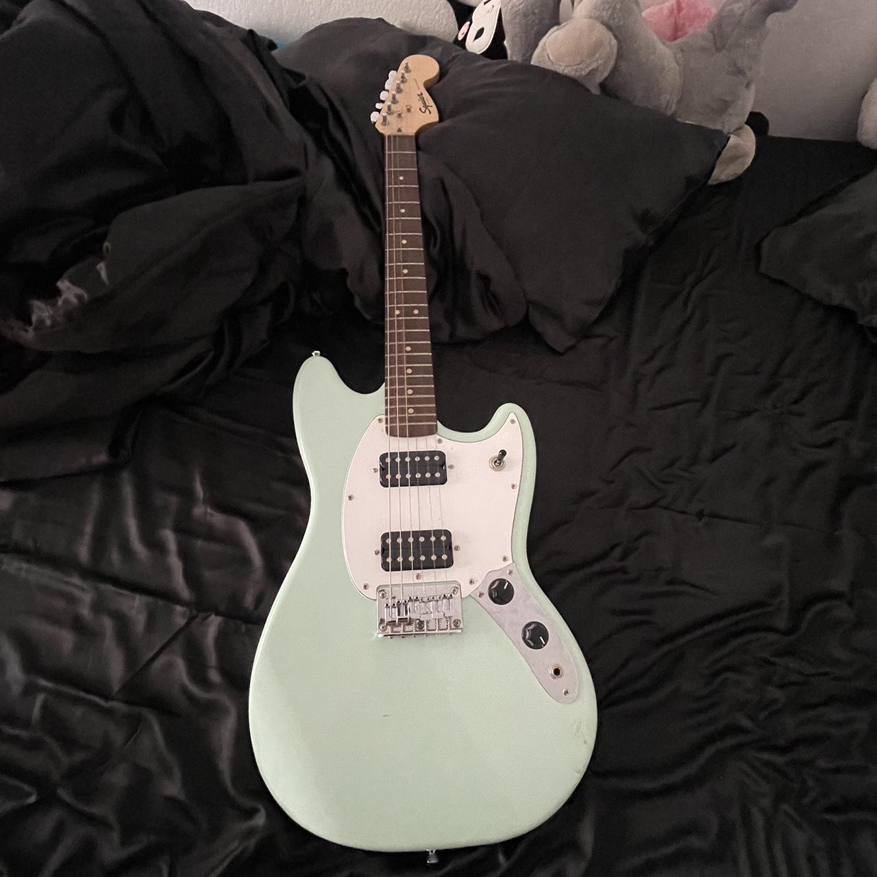 Light blue Fender jazzmaster Mustang guitar with a... - Depop