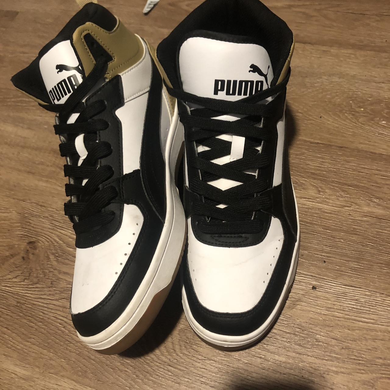 Puma high top black and white sneakers black. Depop