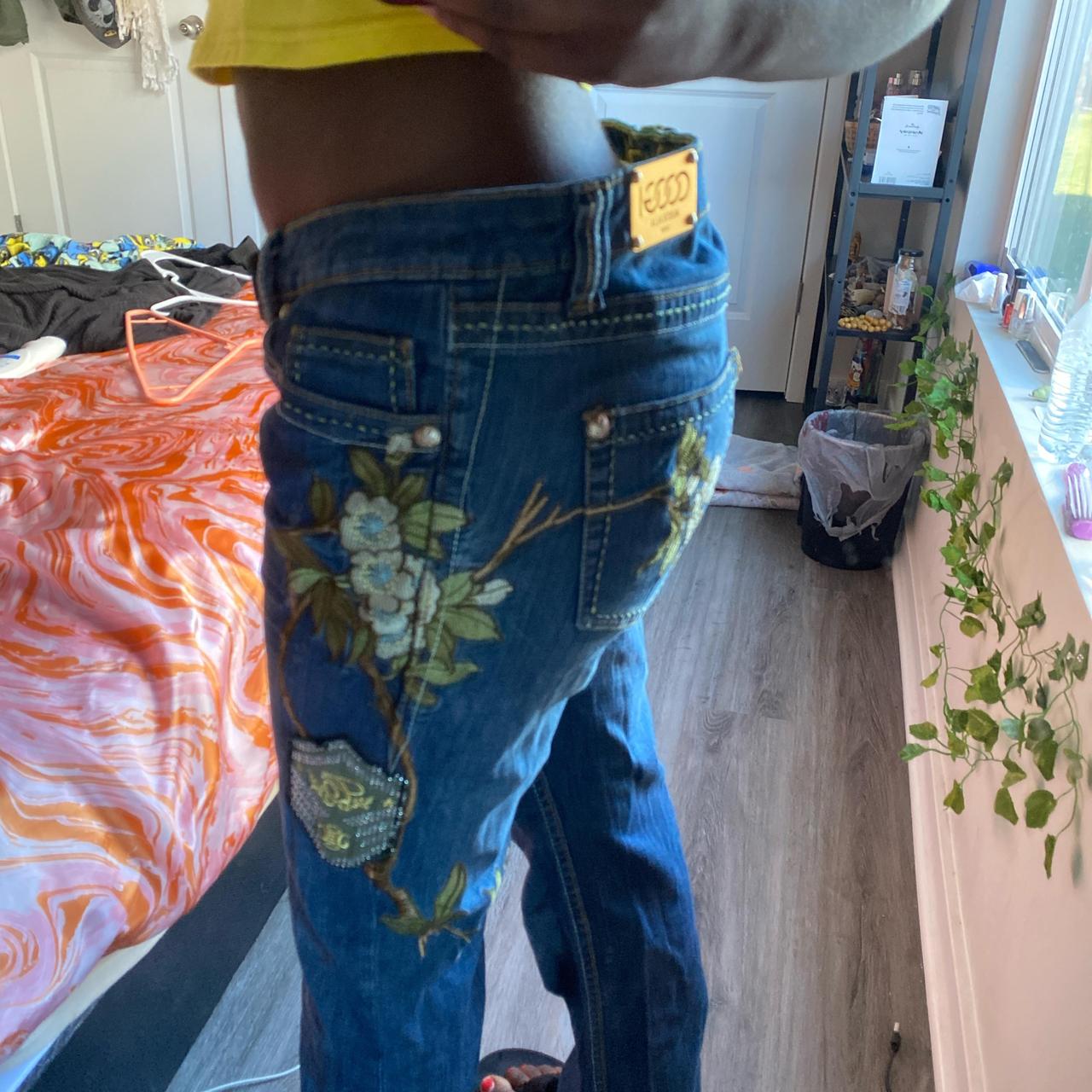 Embroidered low-rise jeans with a unique,... - Depop