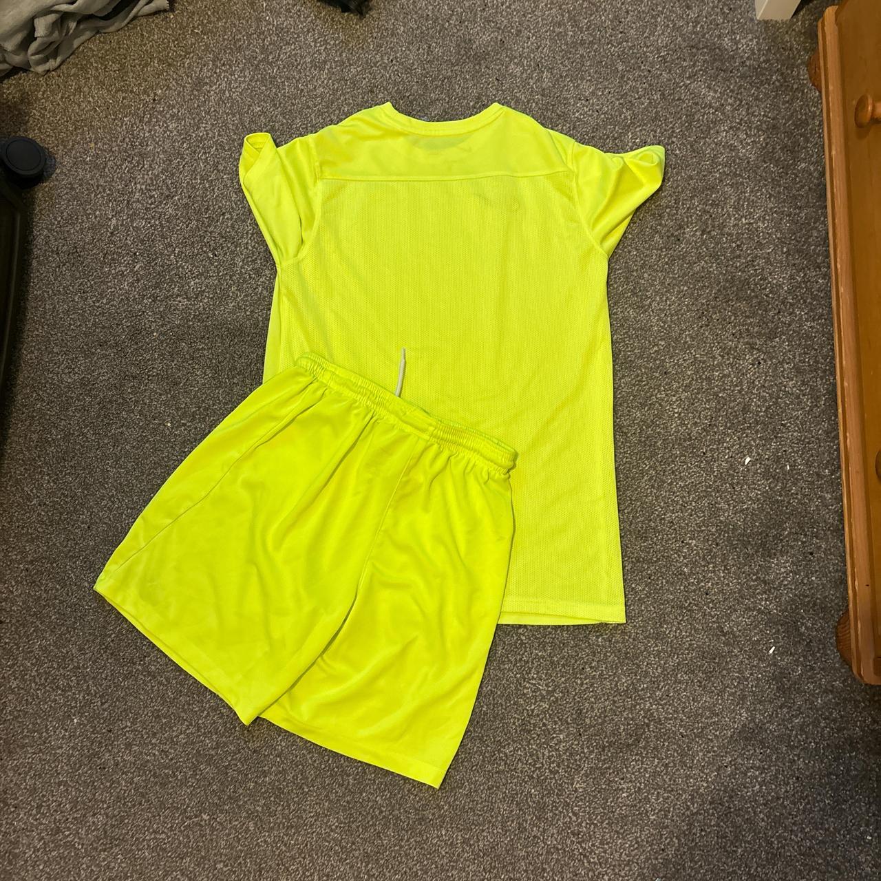 Nike yellow dri fit top and shorts - Depop