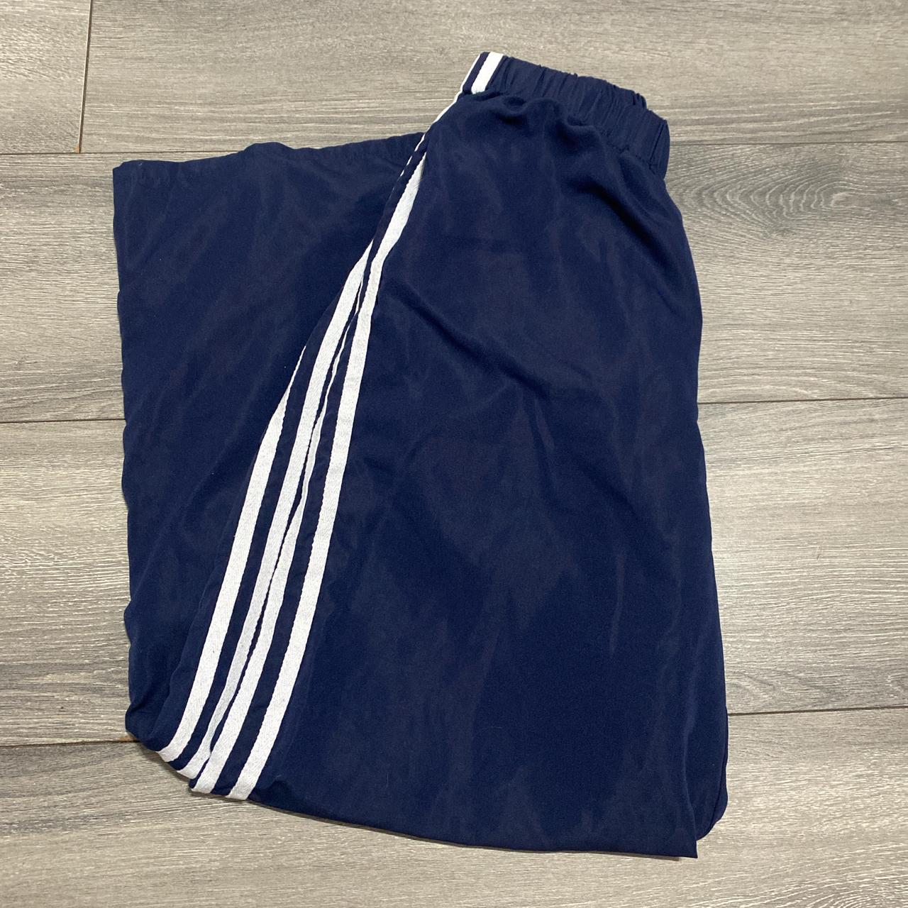 Navy blue and white tracksuit bottoms - Depop