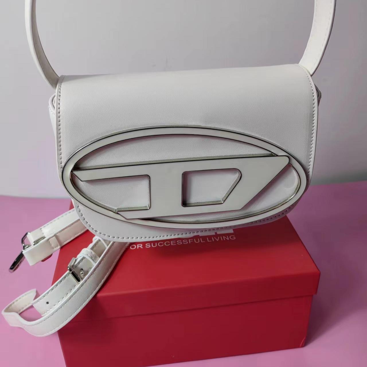 Diesel handbag with shoulder strap, very nice and... - Depop