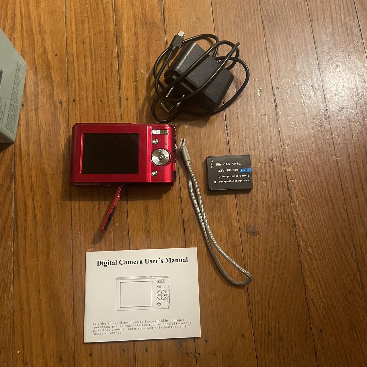 Red and silver digital camera used once or twice... - Depop