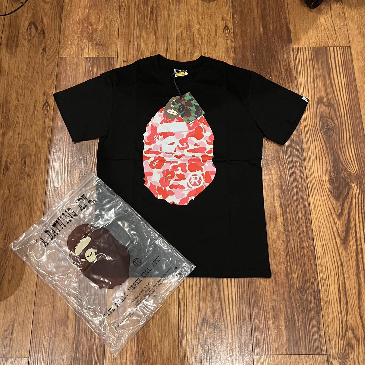Bape shirt🩷🖤 price is negotiable correct bag tags as... - Depop