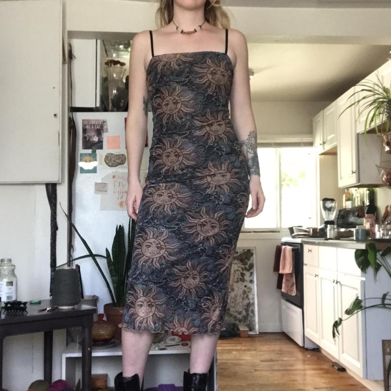 Amazing sun and moon bodycon midi dress Made to look... - Depop