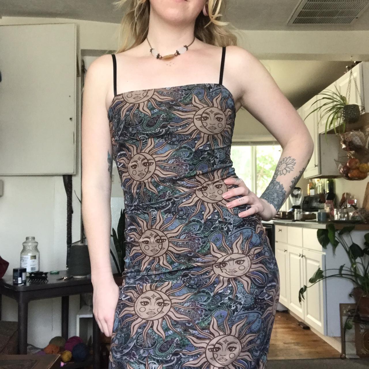 Amazing sun and moon bodycon midi dress Made to look... - Depop