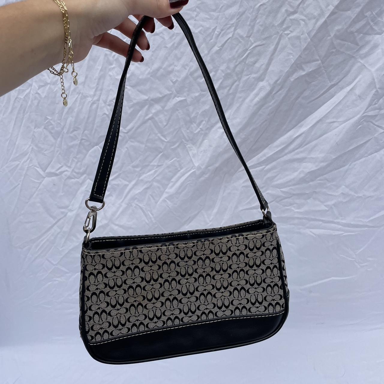 Super cute fake coach bag. Has a little white mark... - Depop