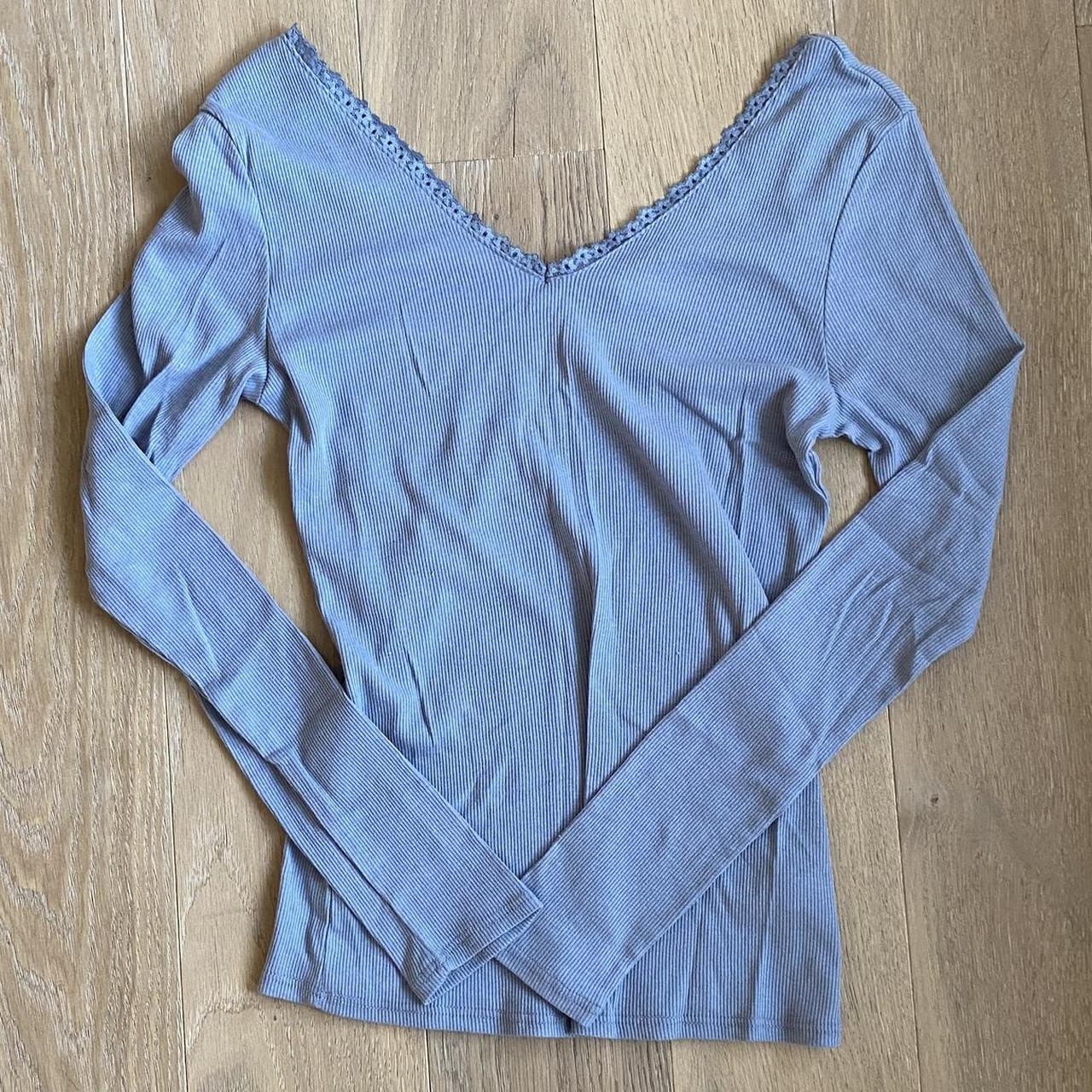 Blue long sleeve ribbed blue top with lace trim... - Depop