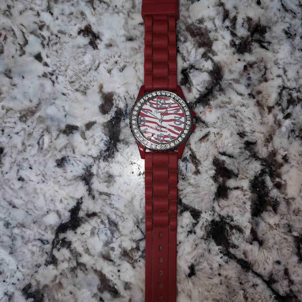 Red Geneva silicone watch. Unsure if it works. May... | Depop