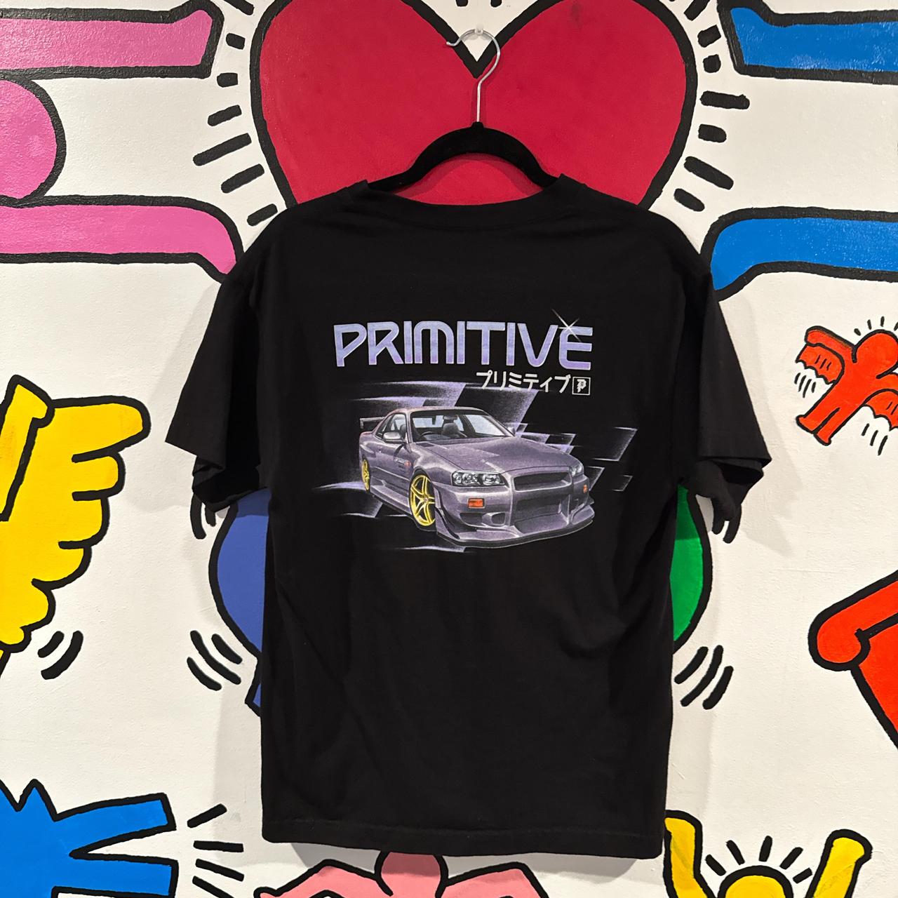 Black Primitive graphic tee with multi-coloured... - Depop