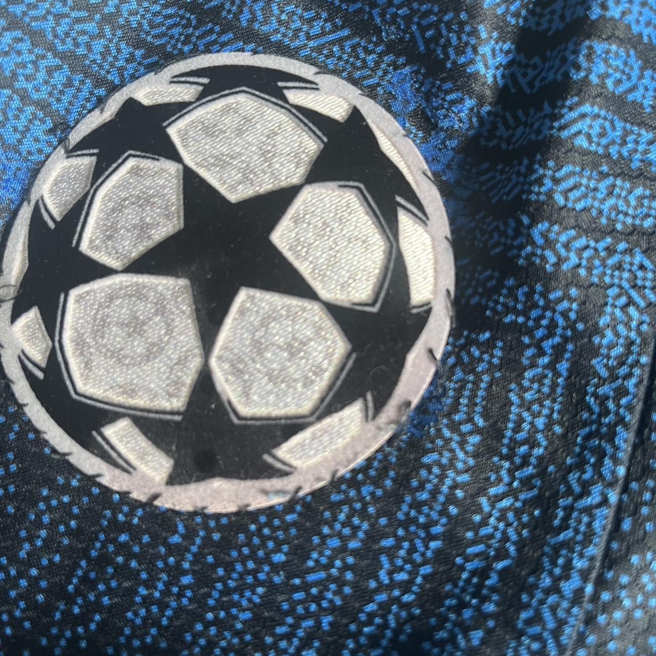 Man Utd 21/22 3rd Kit. UCL badge and writing with... | Depop