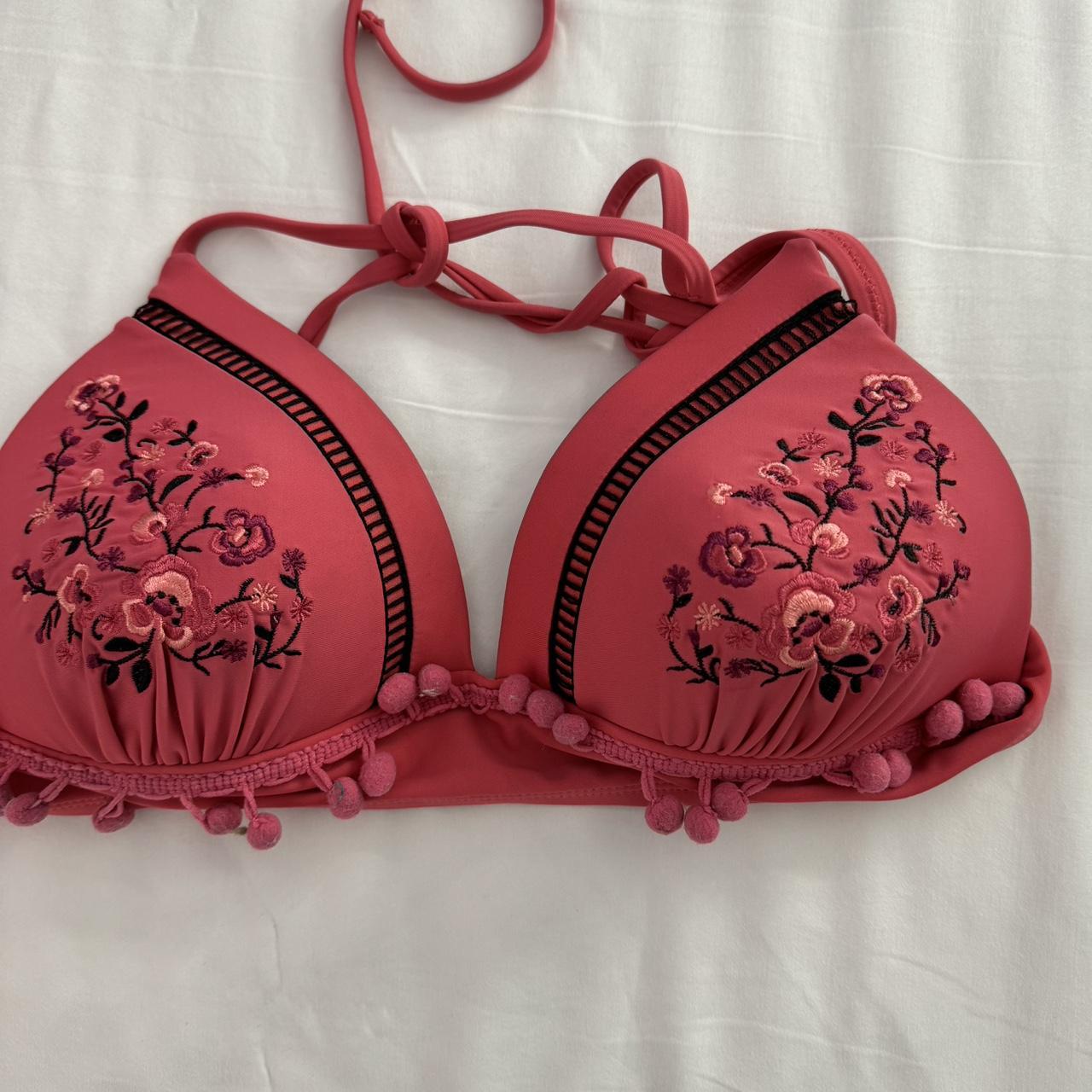 Red bikini top with embroidered floral design,... - Depop