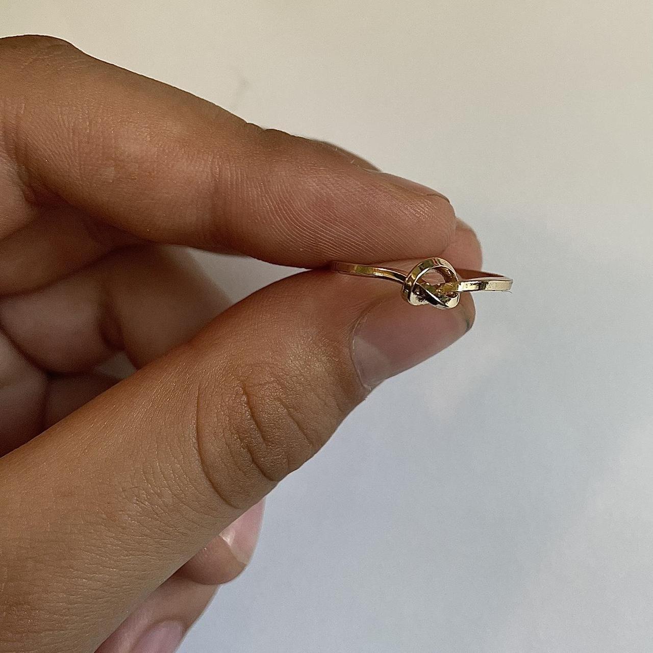 Golden ring with a knot design Size 7 #jewelry... - Depop