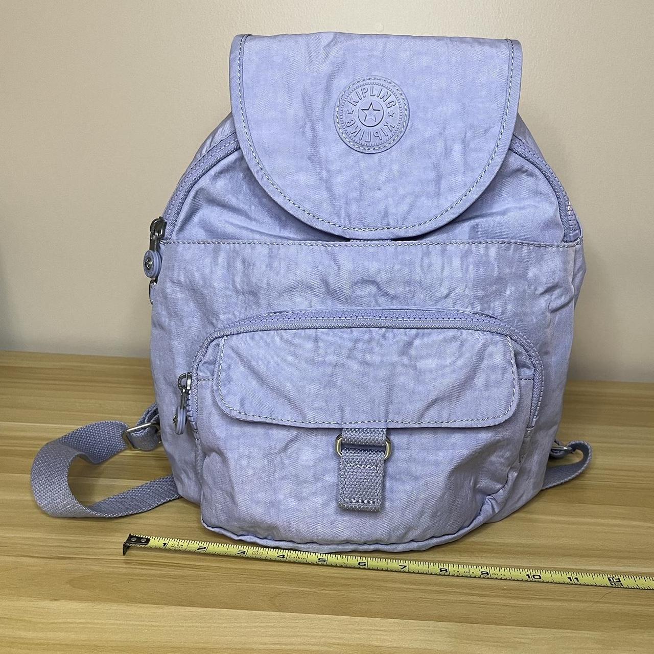 Kipling backpack with adjustable straps and 1 inside... - Depop