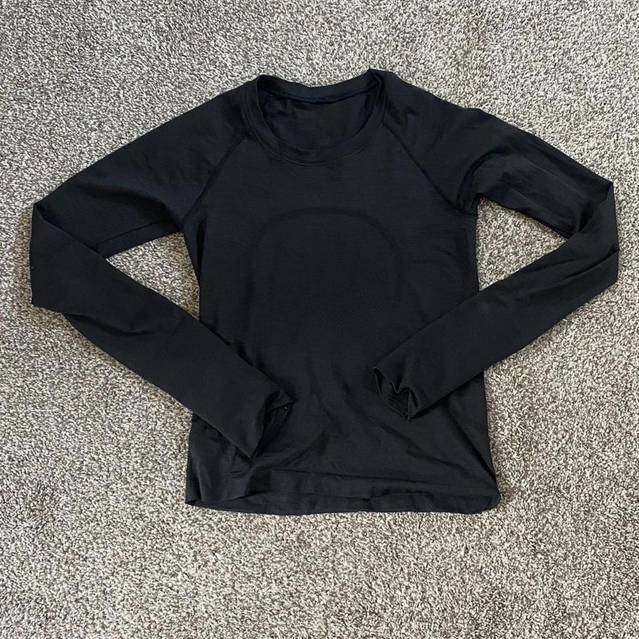 Lululemon Black long sleeve top with thumb holes on... - Depop