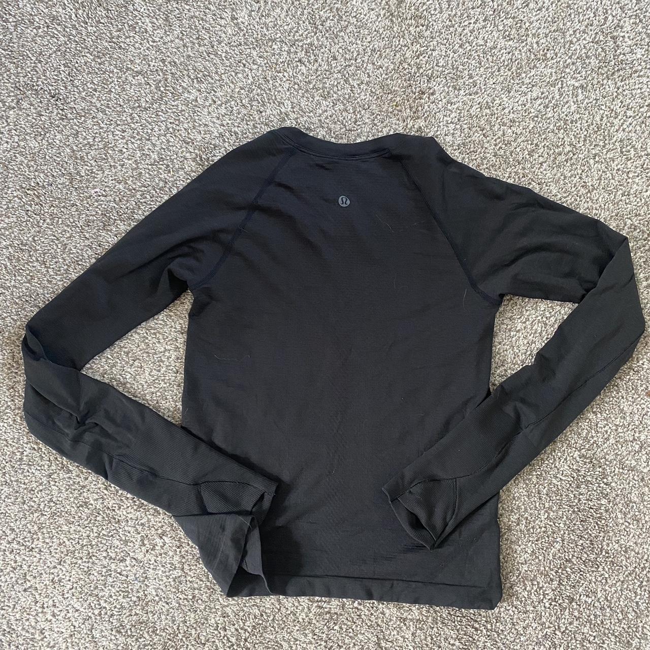 Lululemon Black long sleeve top with thumb holes on... - Depop