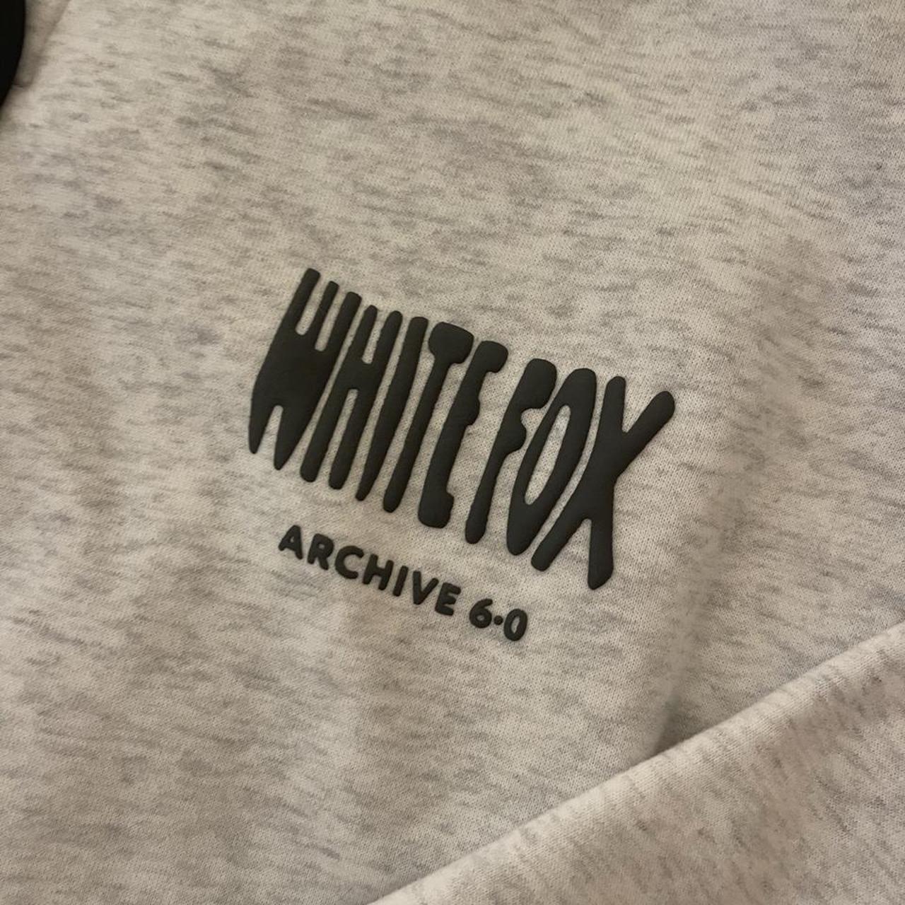 White fox quarter zip still with tags on! Never... - Depop