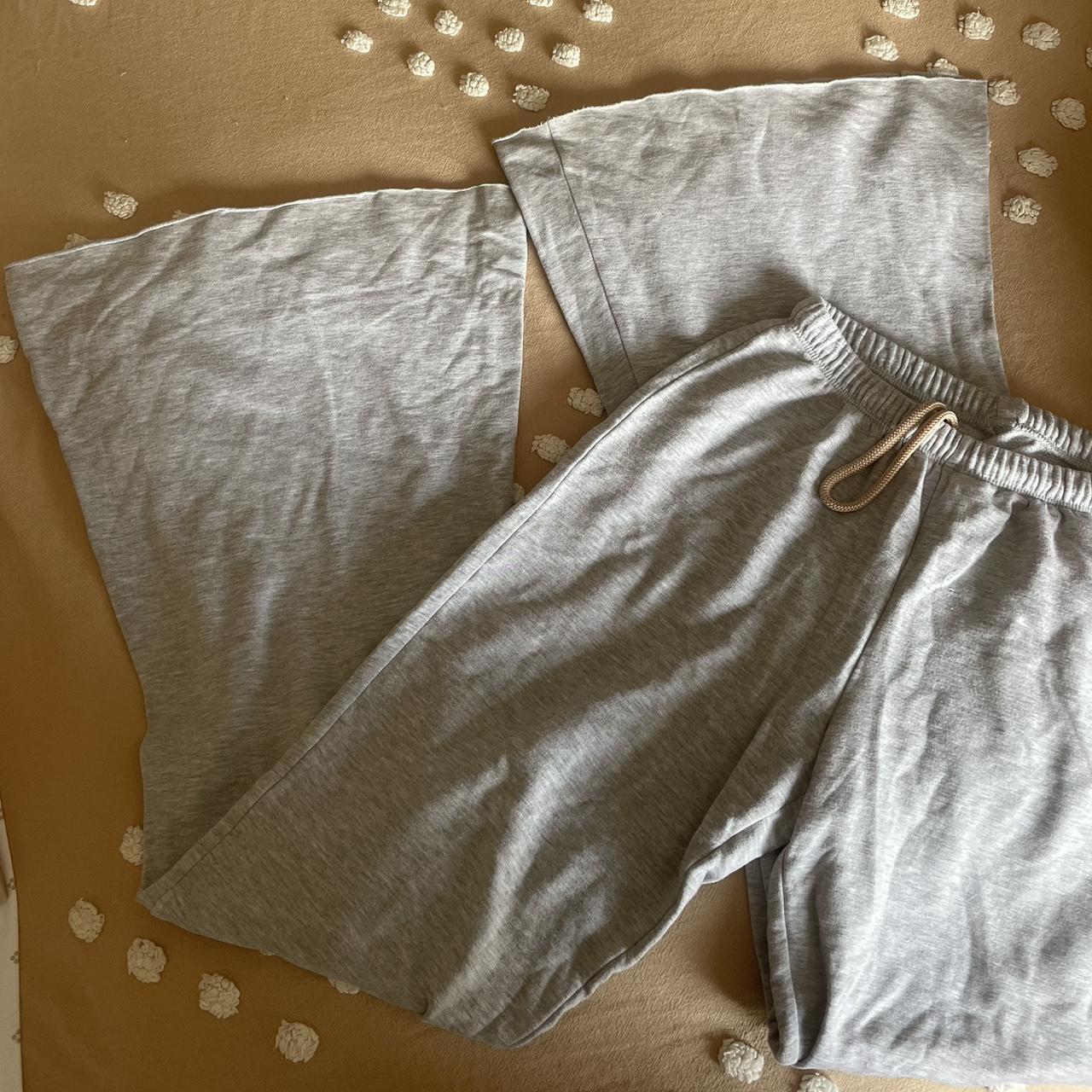 Aerie grey flare sweatpants, small stain on leg,... | Depop
