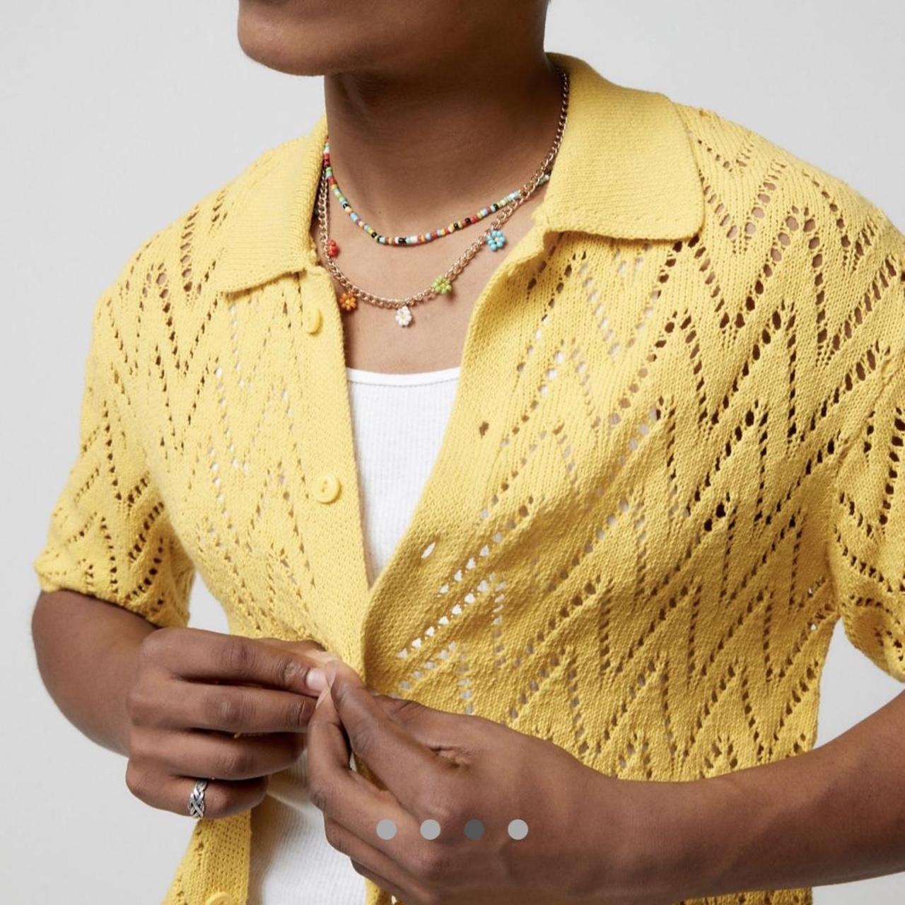 Patterned knit short sleeve button-down sweater by... | Depop