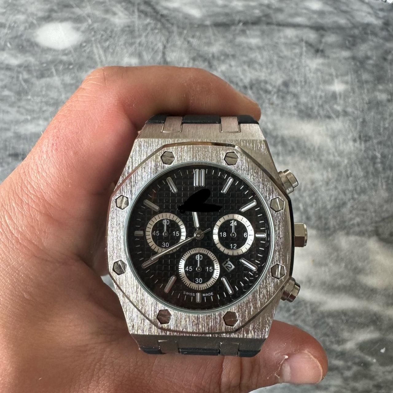 AP Silver and black watch with a unique design,... - Depop