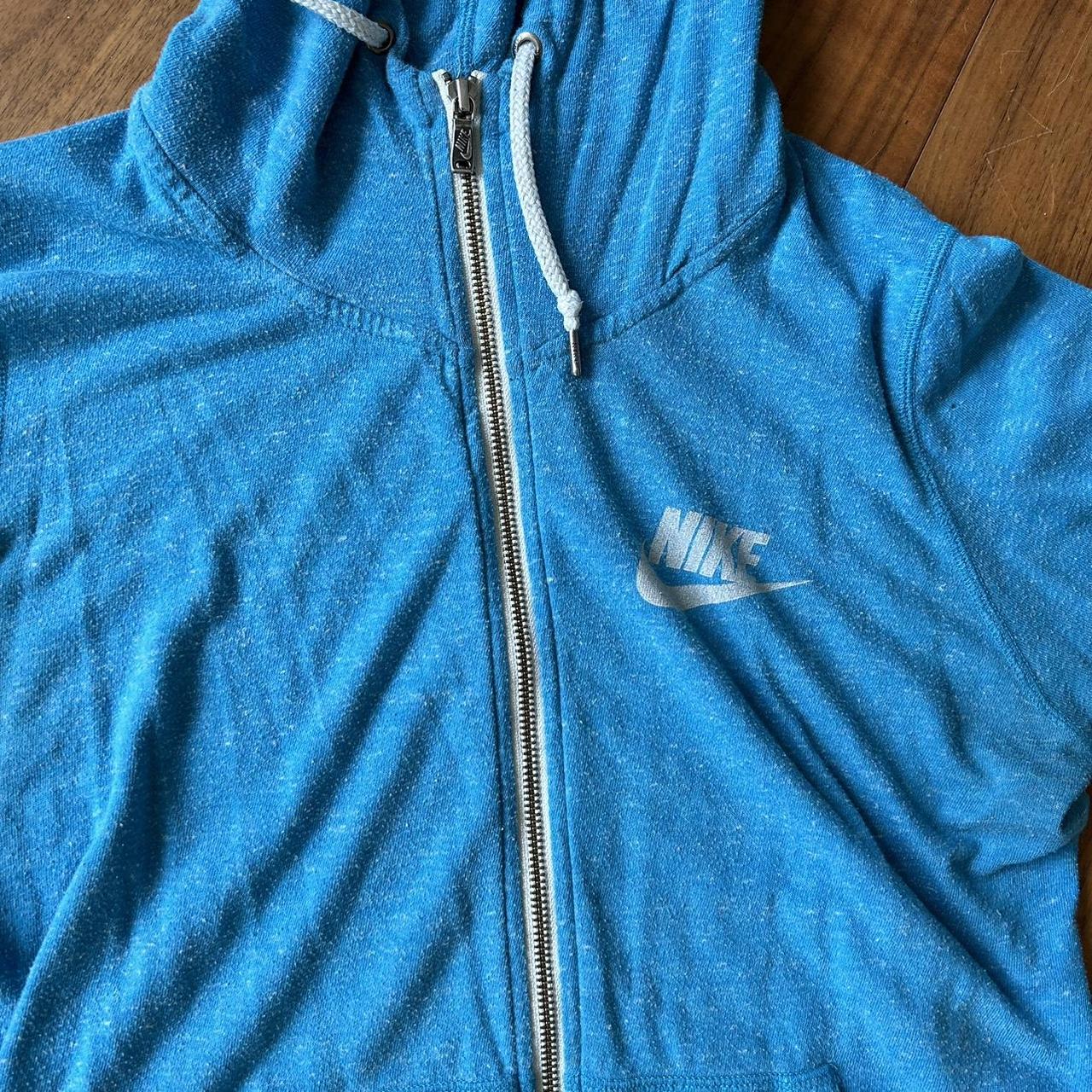 Light blue Nike jacket, zip up size large - Depop