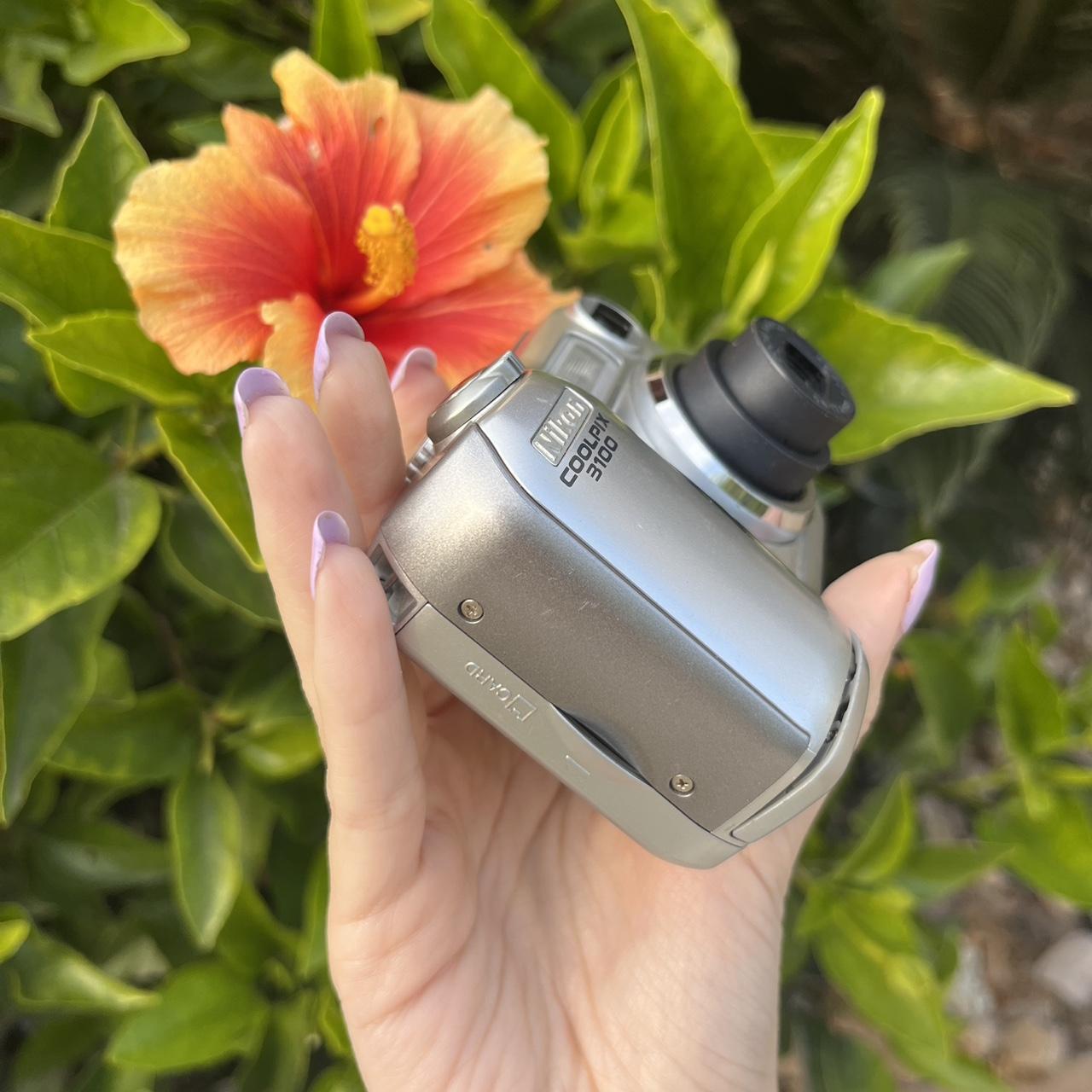 A true classic for capturing life's moments, this... - Depop