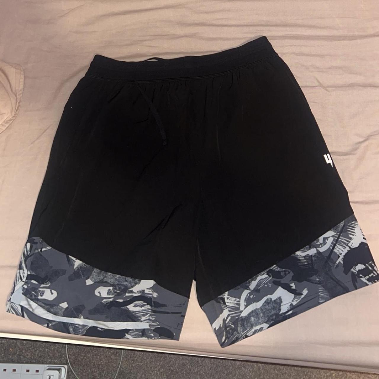 Yelir world performance short | size medium | black... - Depop
