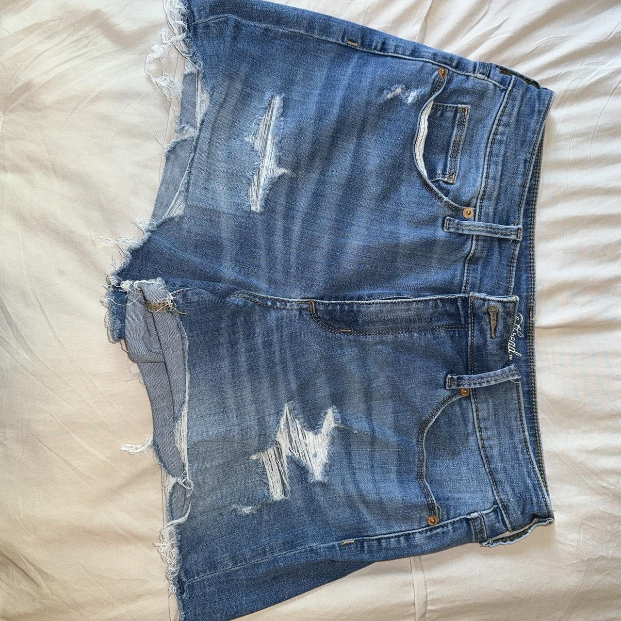 Blue denim shorts with rips - Depop