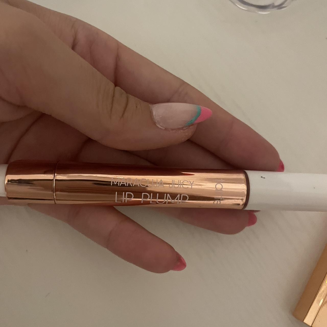 Maracuja lip plumper in shade poppy - Depop